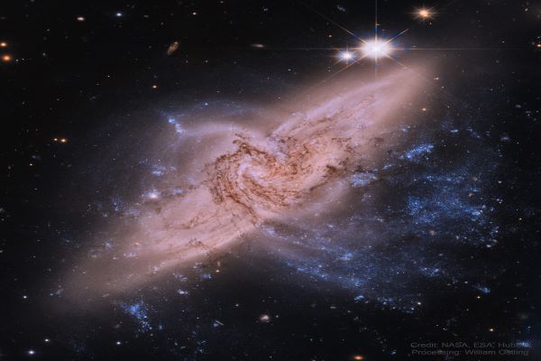 همپوشانی کهکشان های NGC 3314 — تصویر نجومی – فرادرس - مجله‌